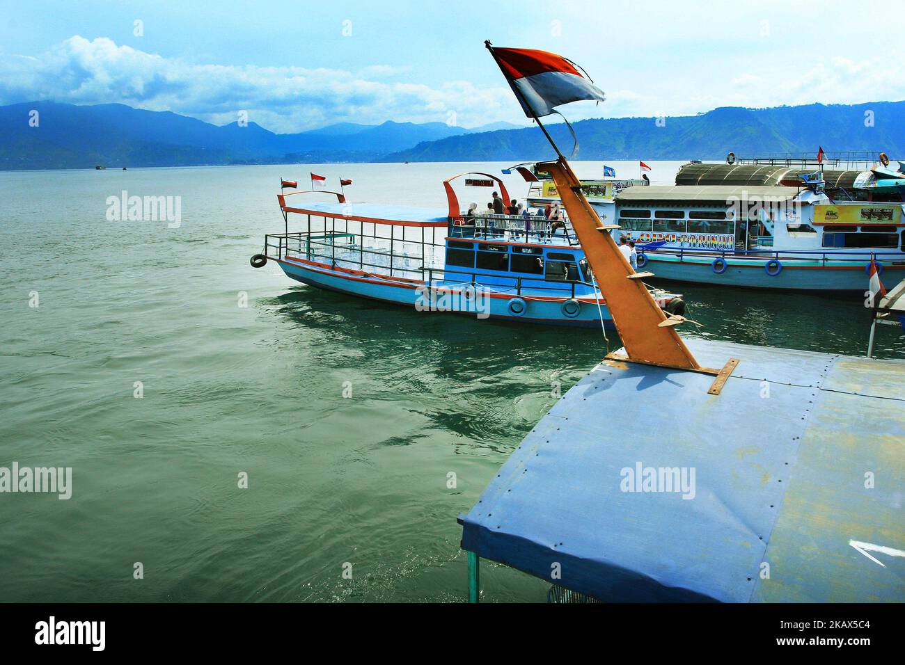 Ships to cross the Lake of Toba. Lake Toba is the largest volcanic lake ...