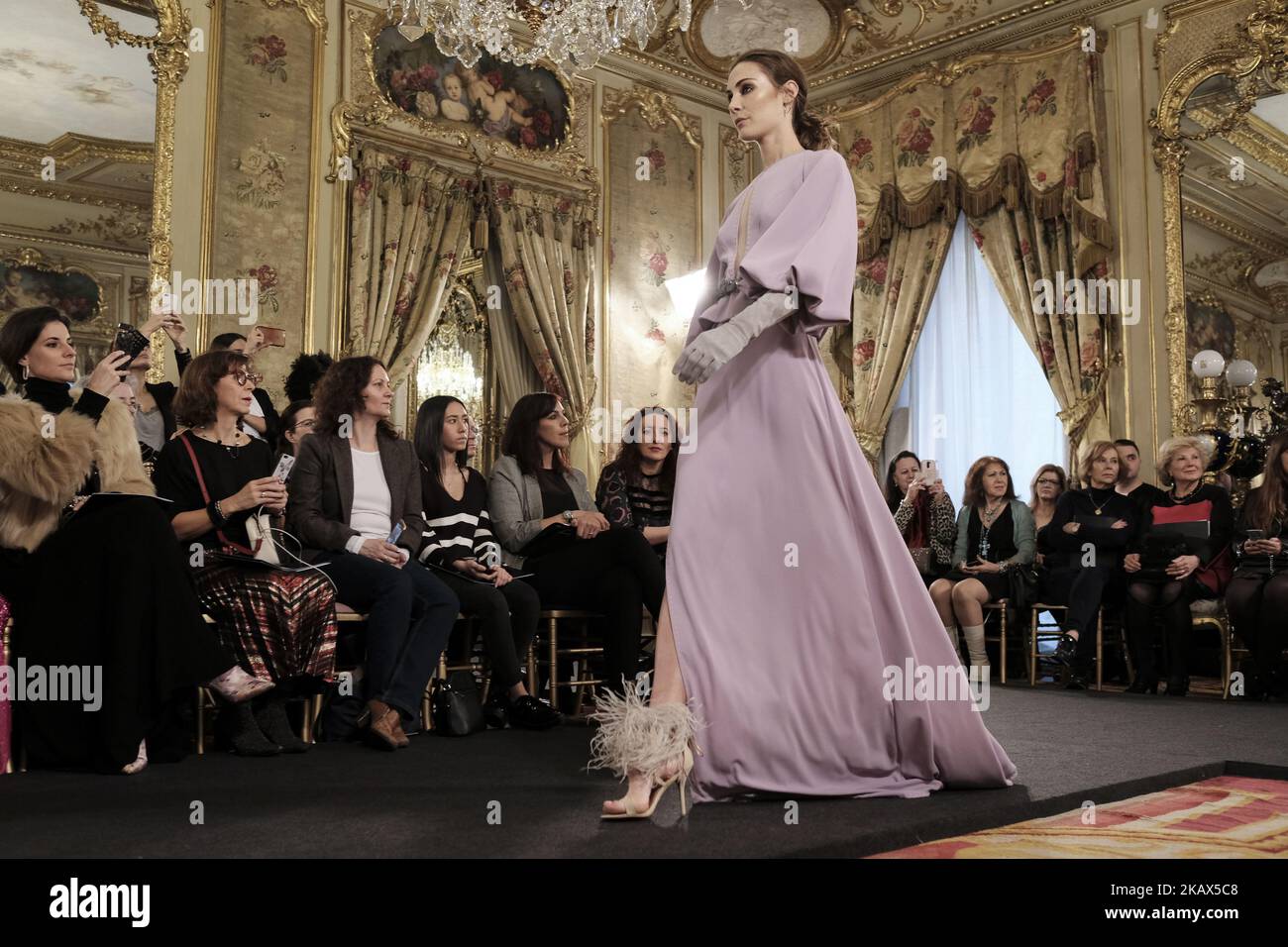 A Model shows a RAFAEL URQUIZAR design during fashion week ATELIER ...