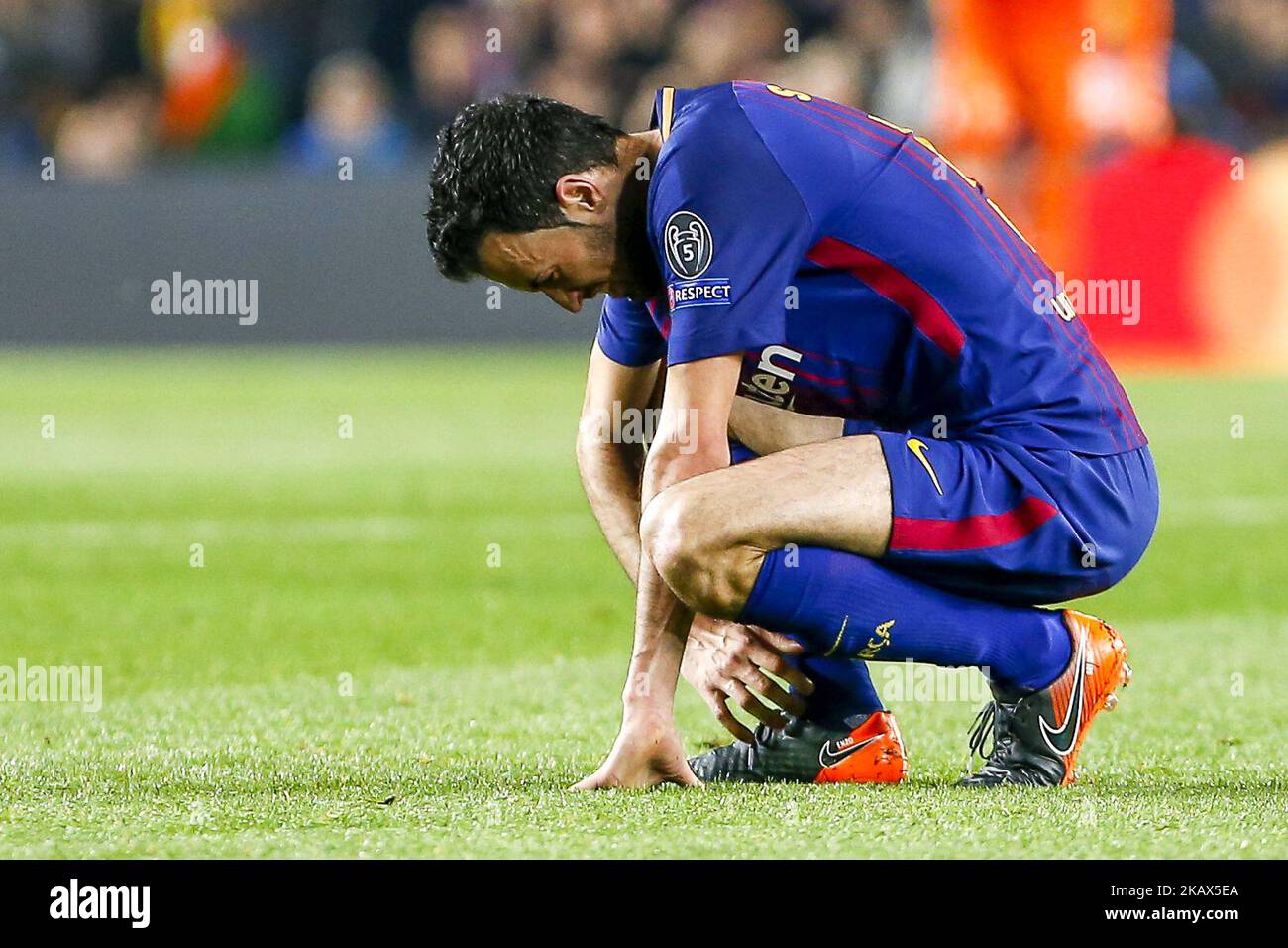 FC Barcelona midfielder Sergio Busquets (5) injured during UEFA ...