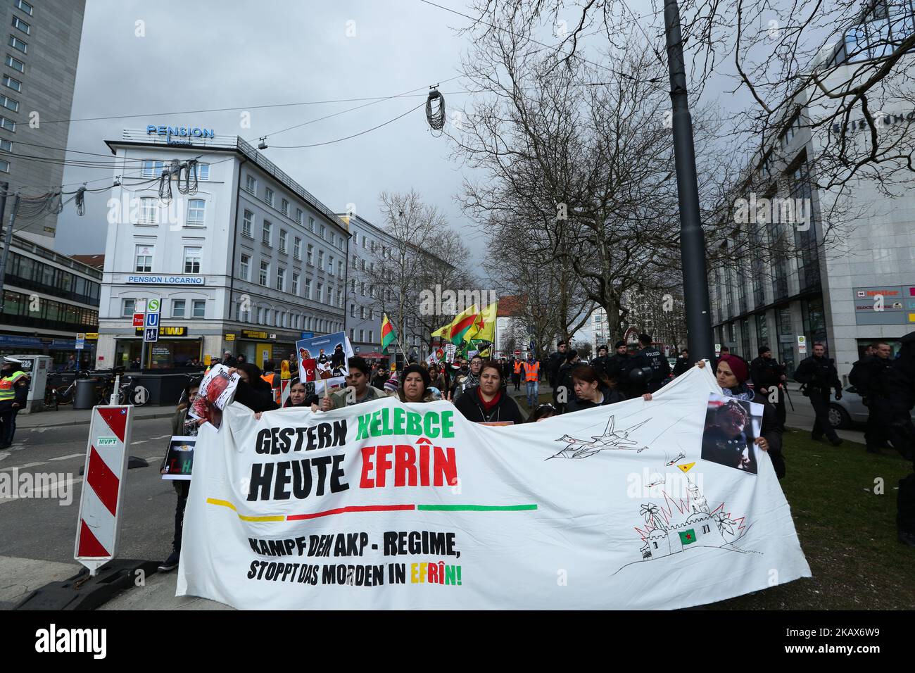 Protestors show flags of Rojava, YPG and YPJ. Hundreds of people ...