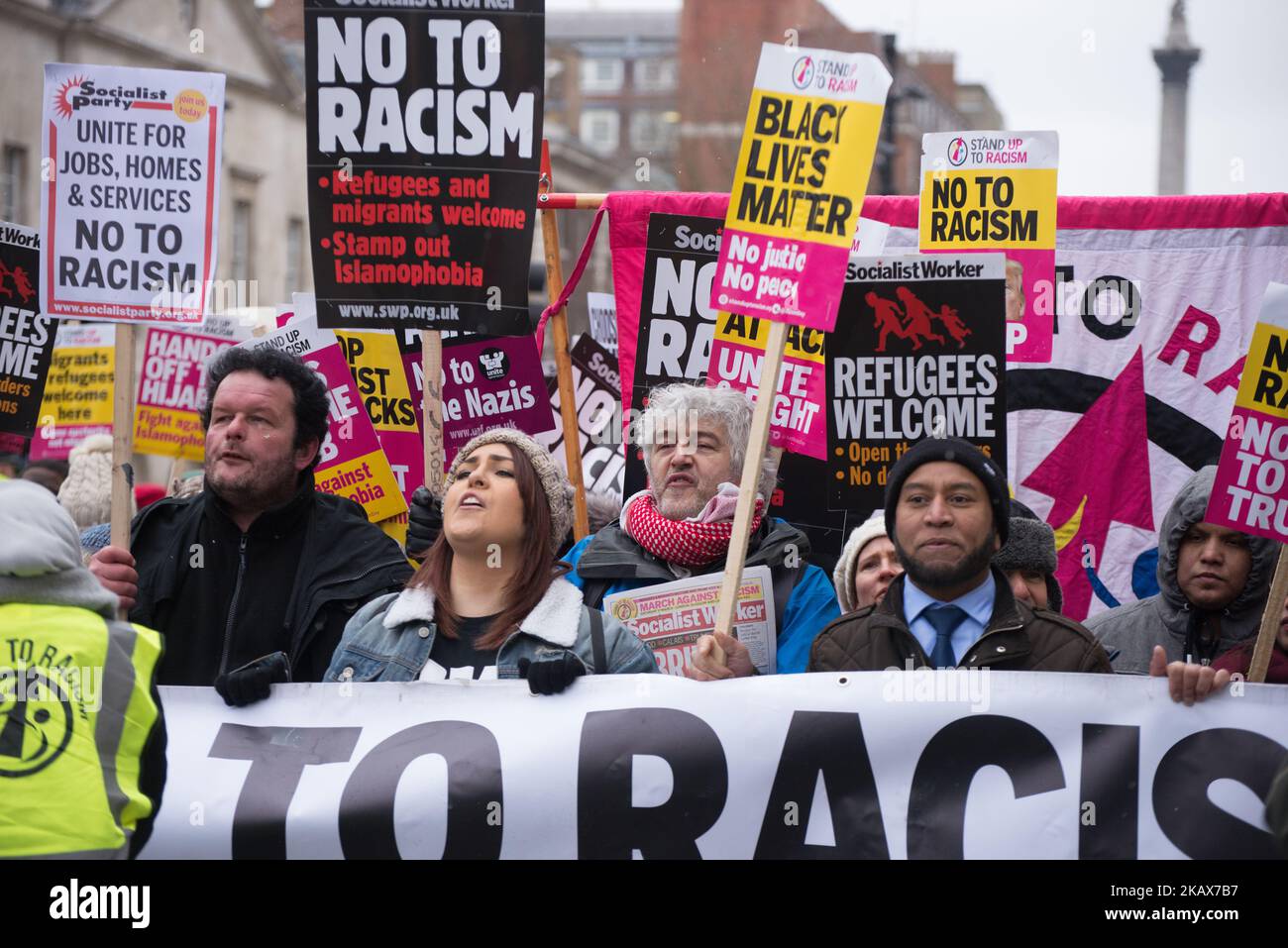 People participate in the Stand Up To Racism demonstration in London ...