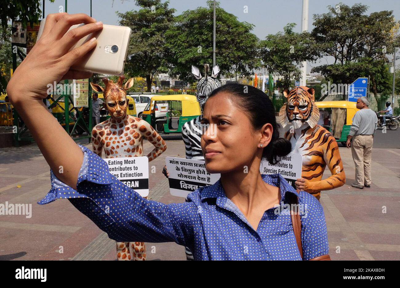 A woman takes a selfie with People for the Ethical Treatment of Animals ...