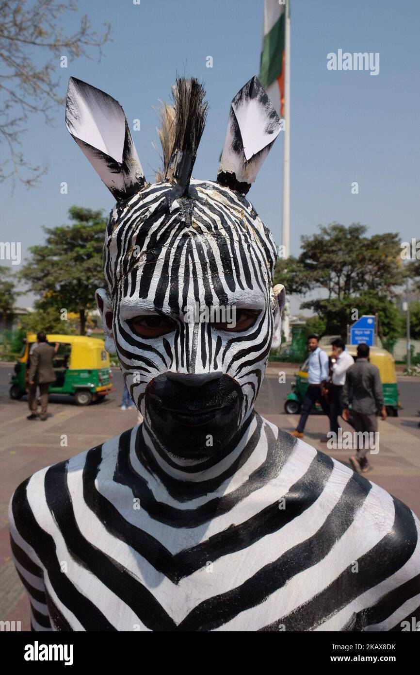 People for the Ethical Treatment of Animals (PETA) member body-painted ...