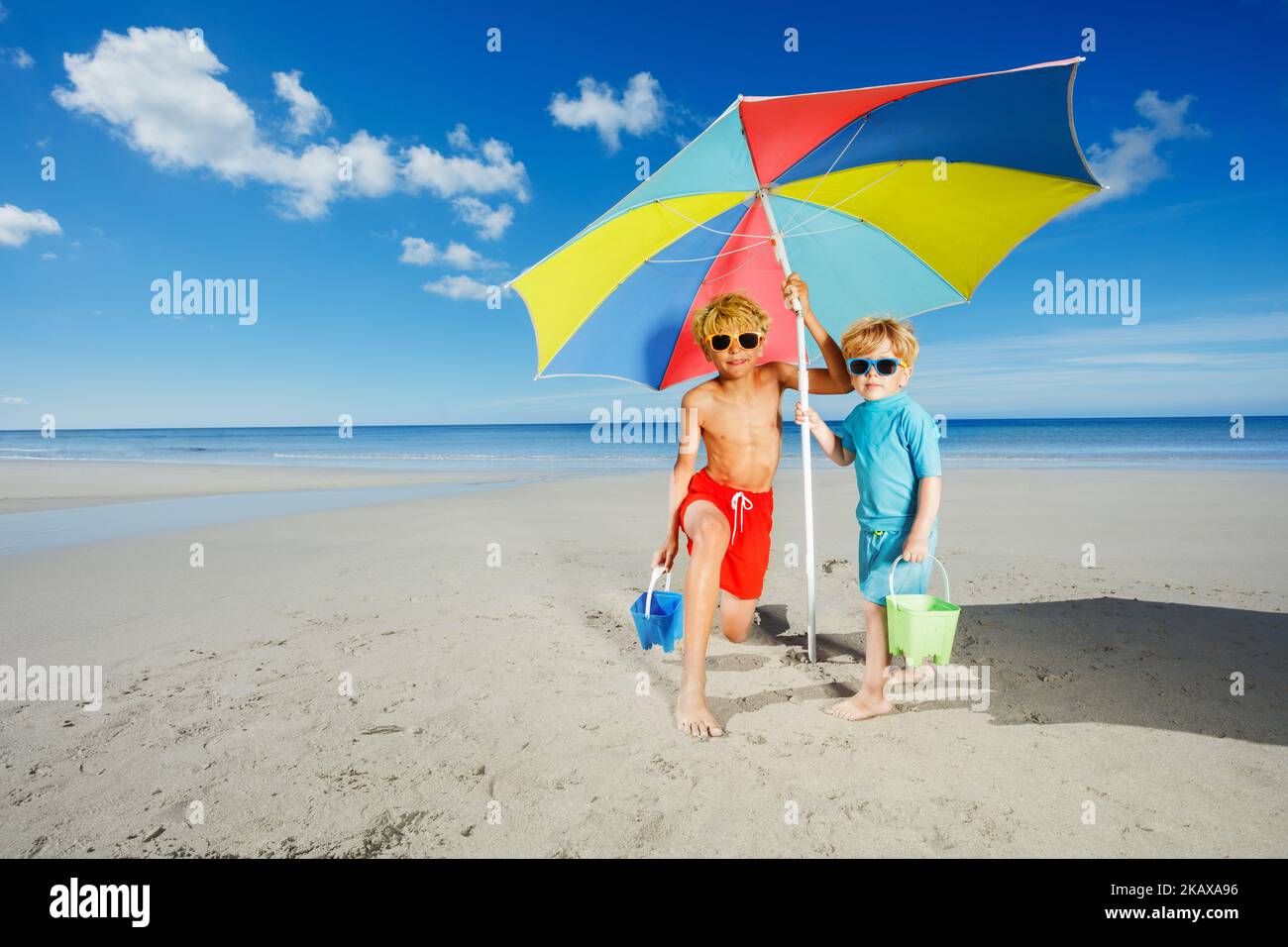 Two boys in the ocean hi-res stock photography and images - Alamy
