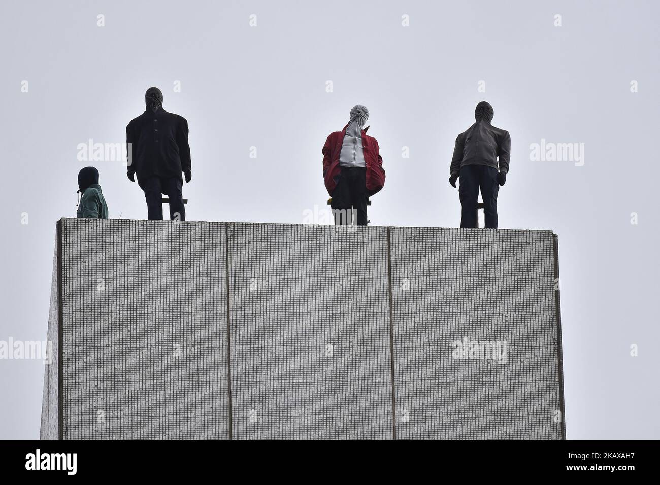 Life-sized sculptures of 84 men are pictured as they have been ...