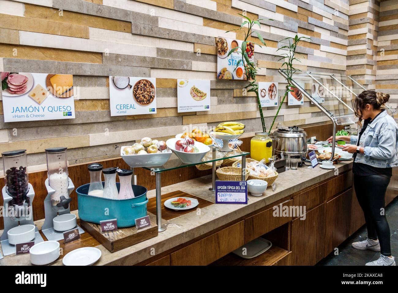 Woman women female self serve service buffet table bar fruit hi-res ...