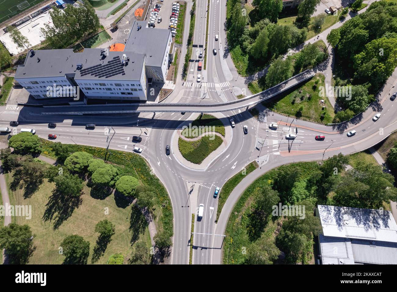 Street, roundabout, and pedestrian bridge over the crossroad Stock ...