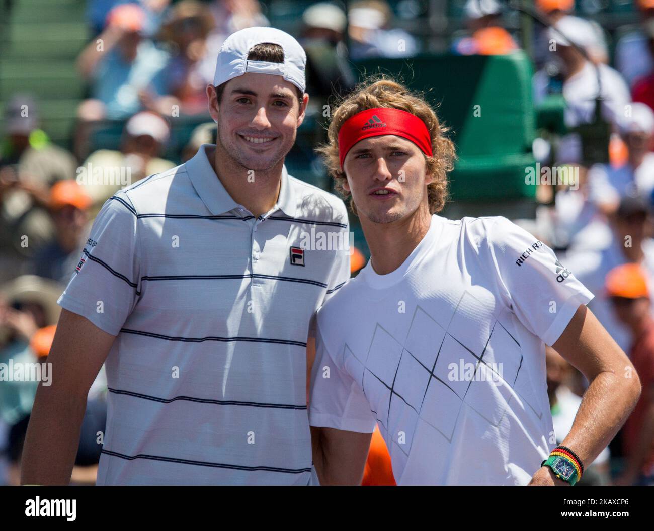 John Isner, from the USA and Alexander Zverev, from Germany, poses for ...