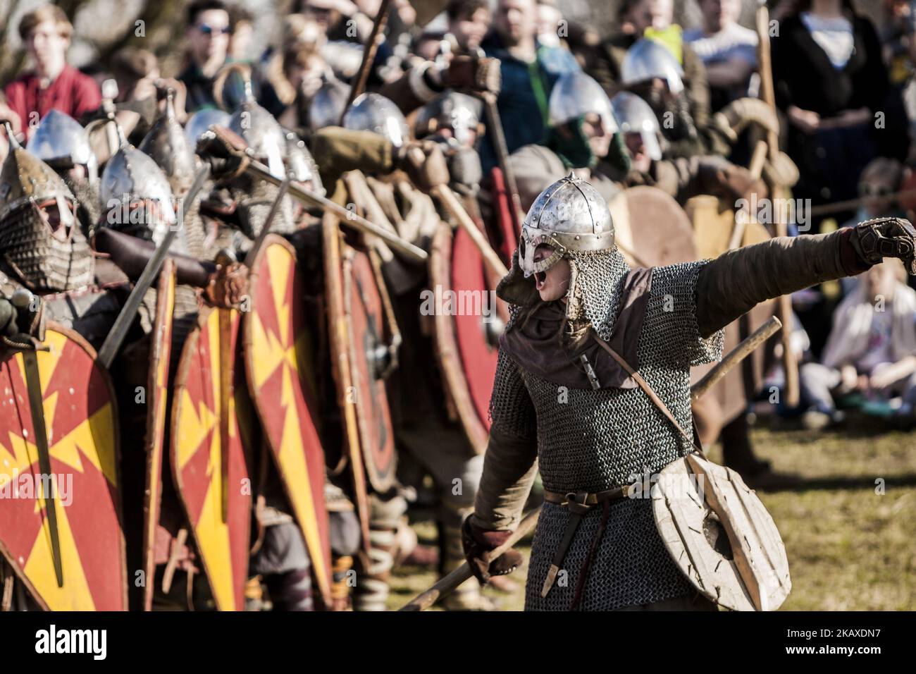Warrior in medieval costumes shouts to his troops during the ...