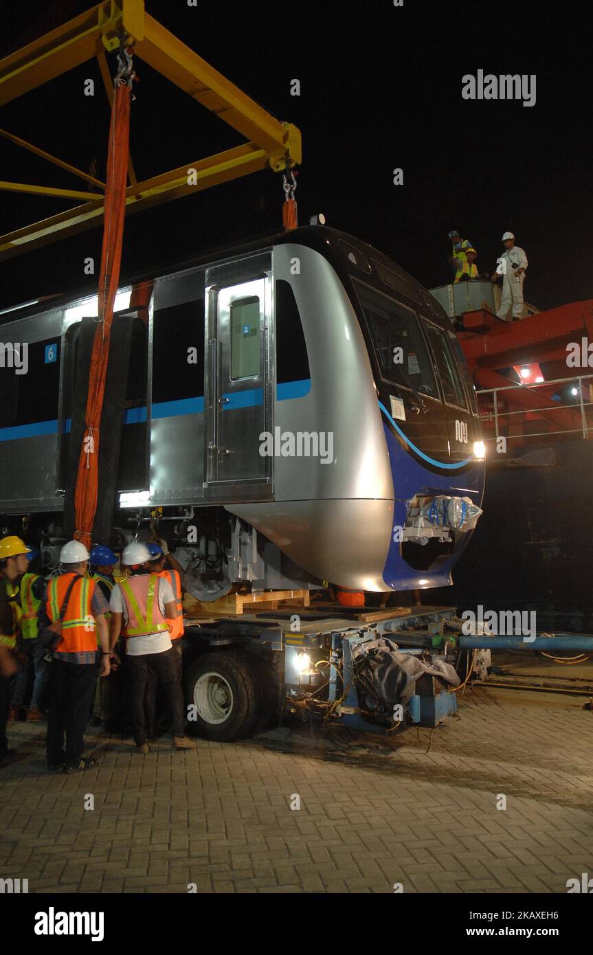 Workers took down the head of the Mass Rapid Transit (MRT) train at ...