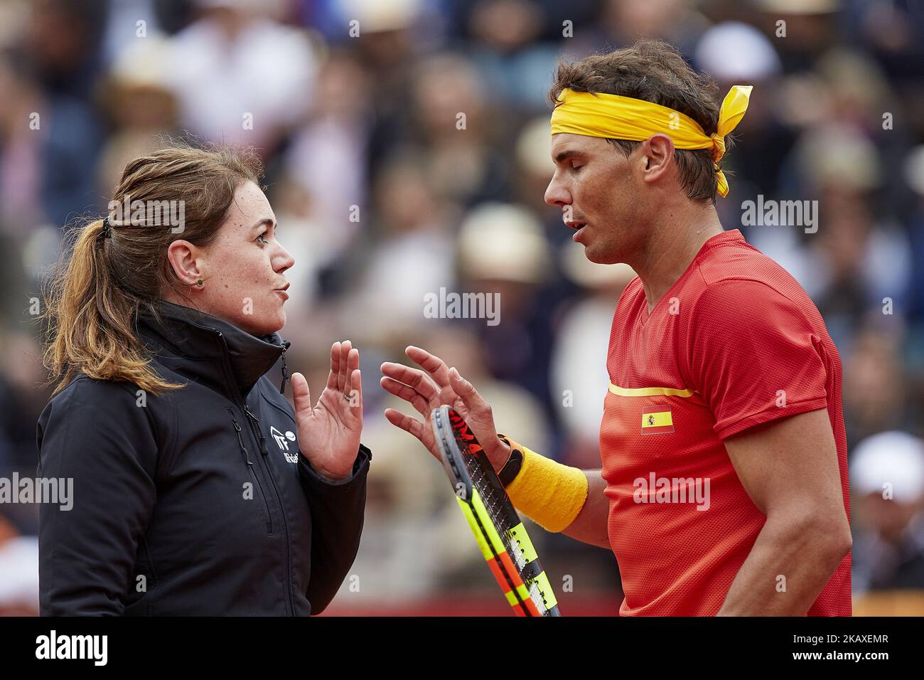 Rafael Nadal (R) of Spain talks with referee Louise Azemar-Engzell of ...