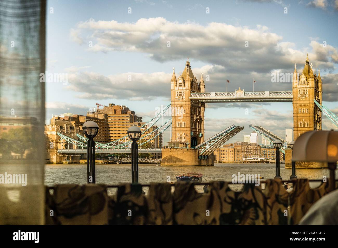 Tower Bridge London opening of the bridge at sunset shot through the ...