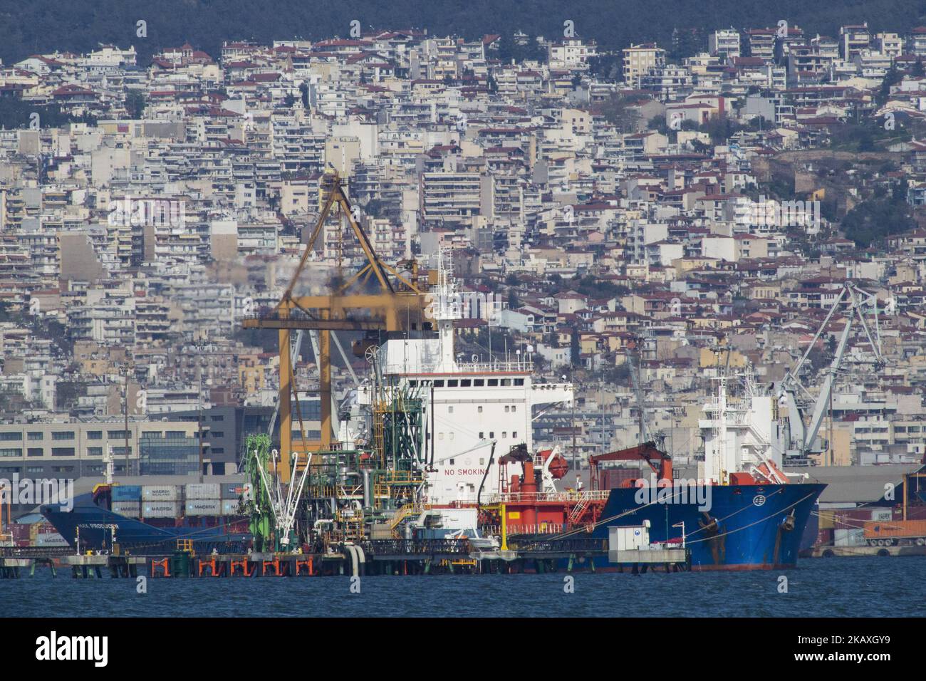 Freighter ships as seen in Thessaloniki city in Greece, having one of ...