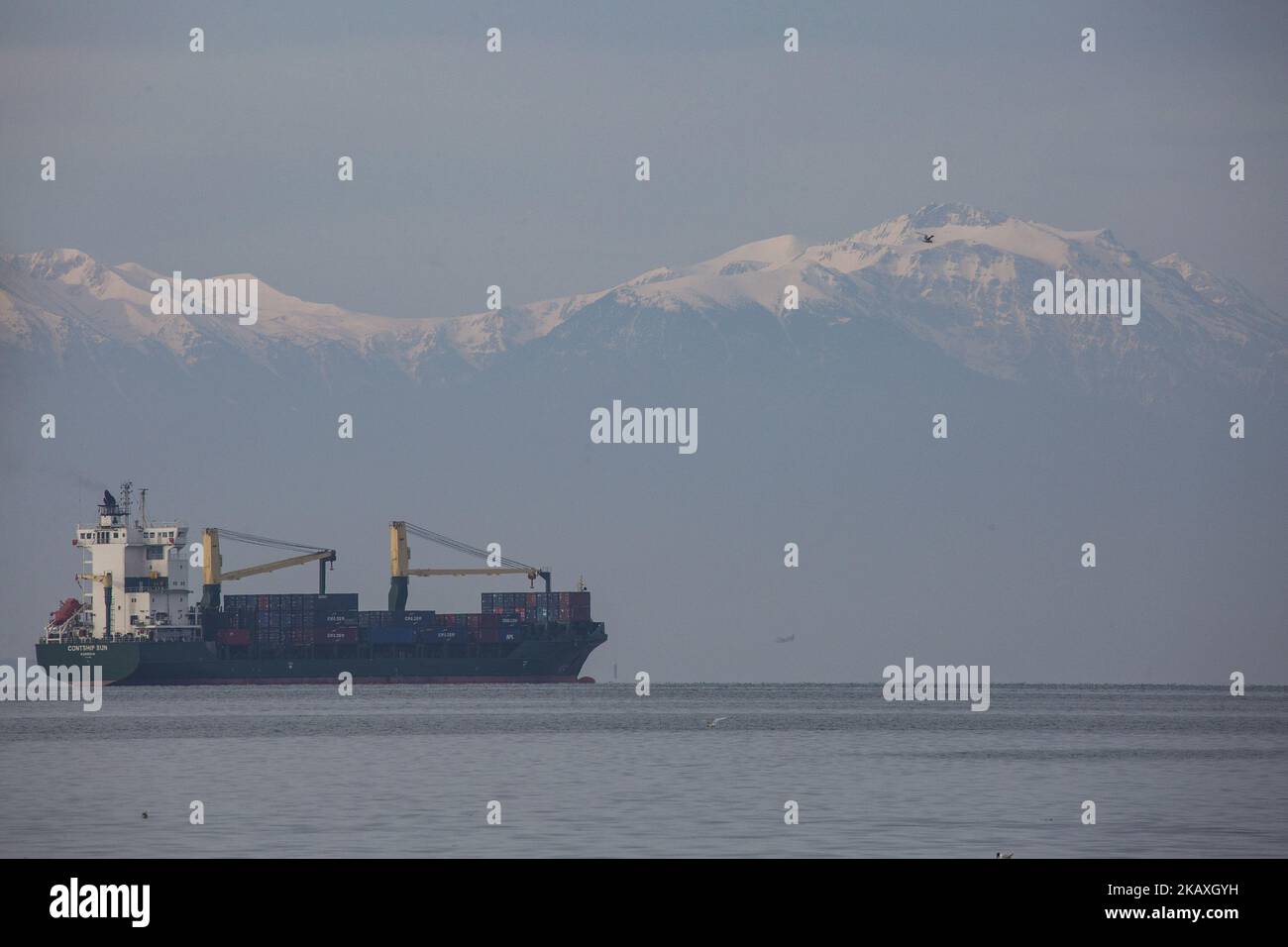 Freighter ships as seen in Thessaloniki city in Greece, having one of ...