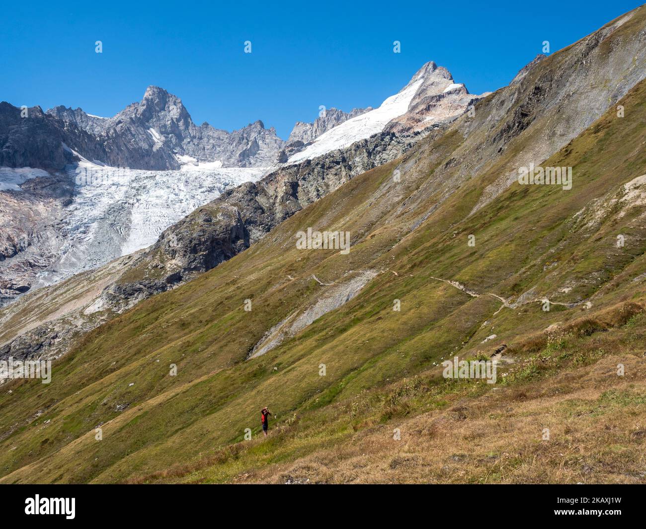Hiking path from pass Petit Col Ferret (back) to Grand Col Ferret ...