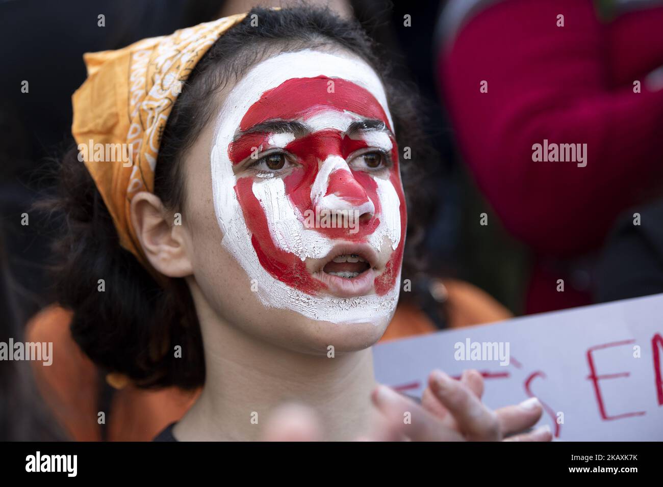 Fourteen-year-old, Zoe Peters, with a target painted on her face ...