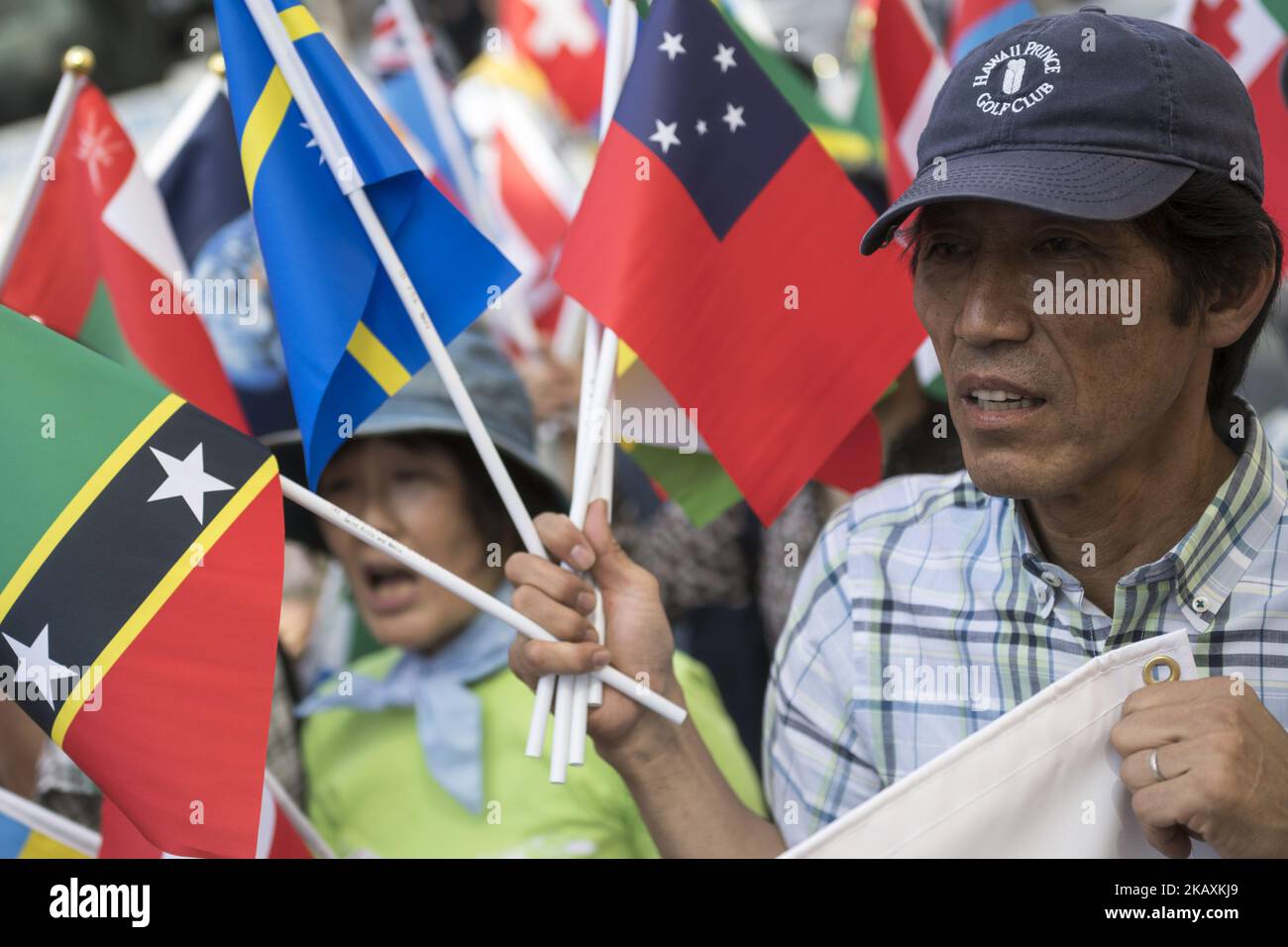 Activists shout slogans holding flags during the Annual Earth Day in ...
