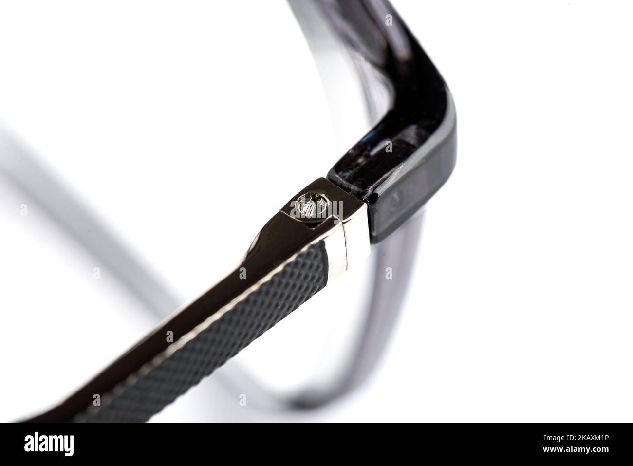 Close-up of a hinge with a screw or a place where the temple is ...