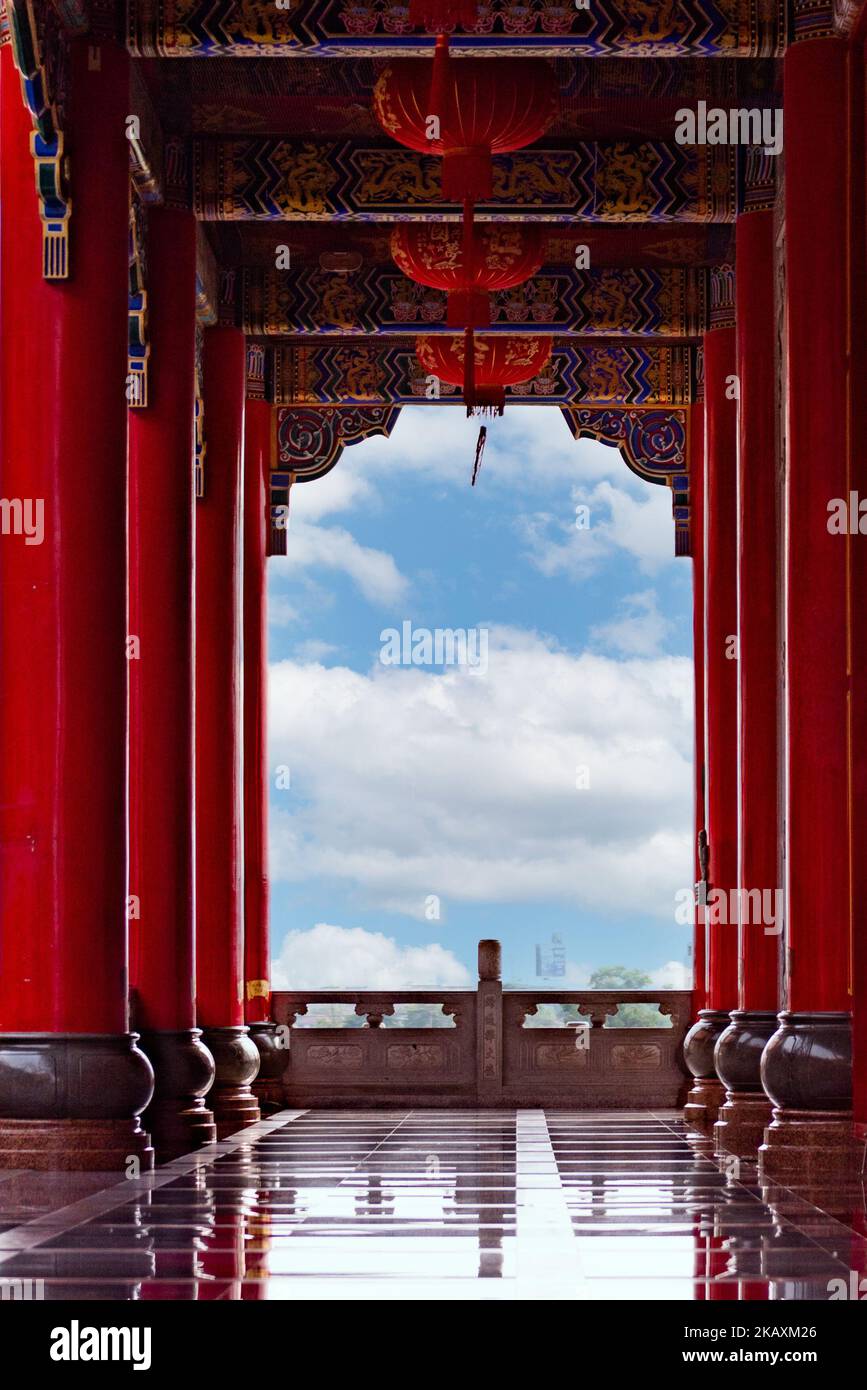 A vertical shot of the Chinese architecture of a temple in Thailand ...