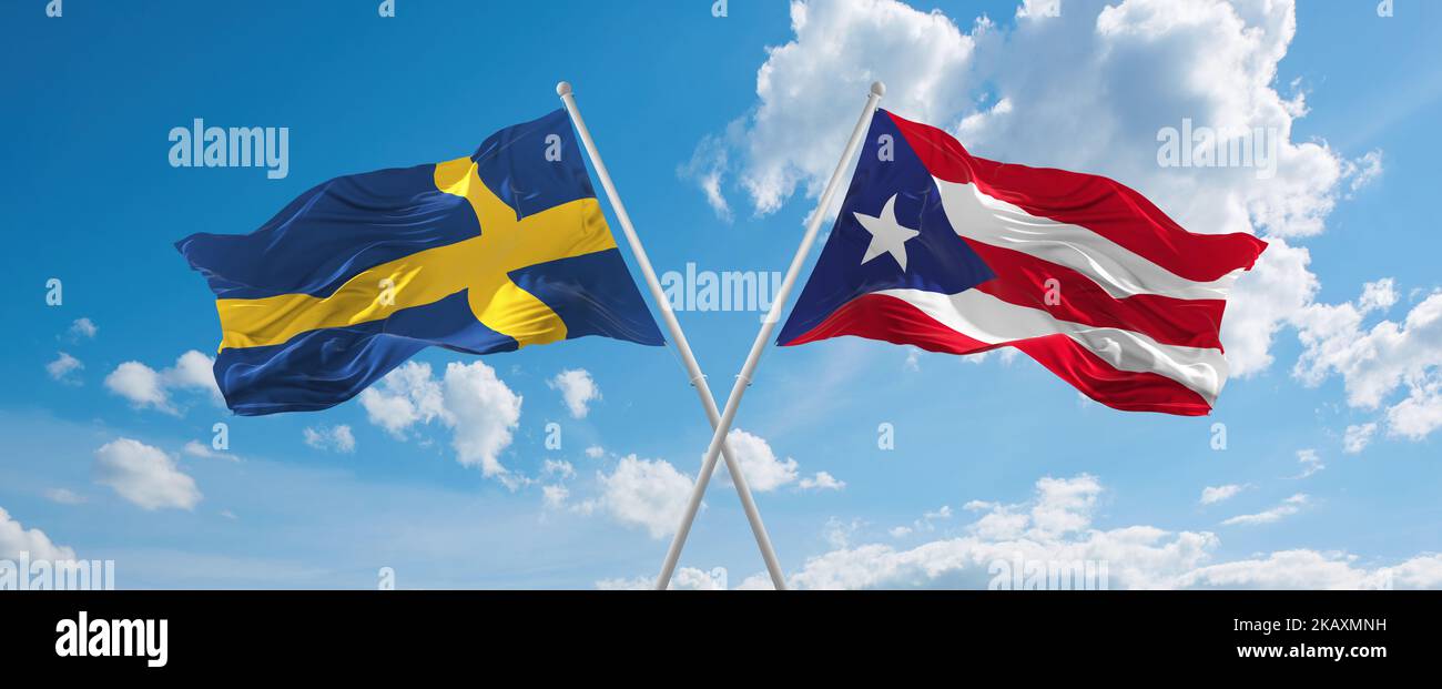 two crossed flags Puerto Rico and Sweden waving in wind at cloudy sky. Concept of relationship ...