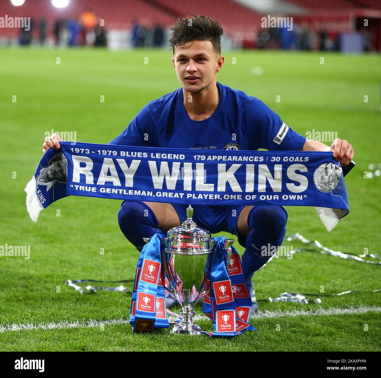 George McEachran of Chelsea poses with a Ray Wilkins scarf and the ...