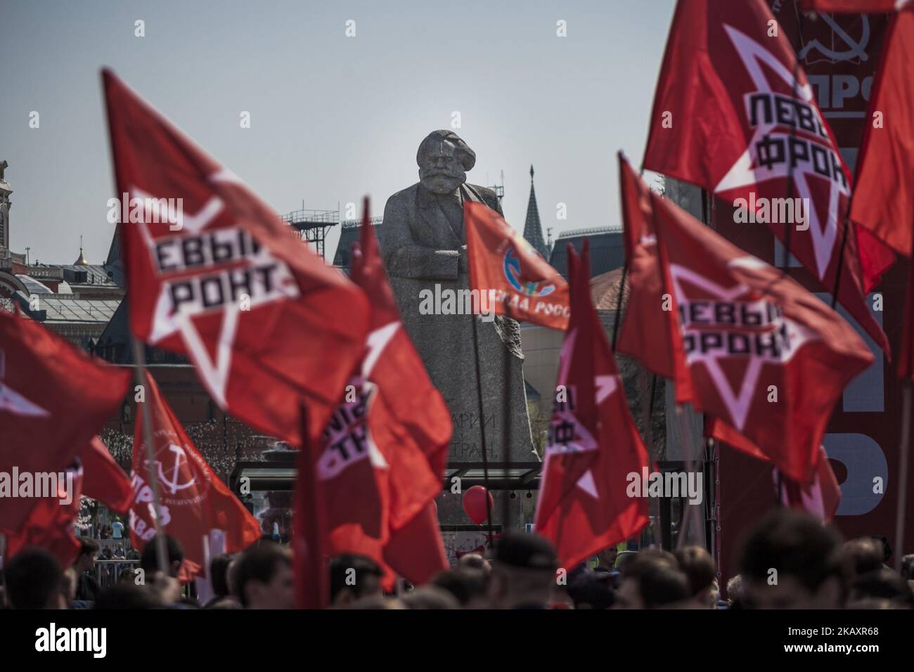 Karl Marx statue surrounded of flags of the Comunist party during the ...