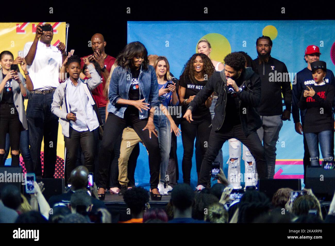 Michelle Obama dances on stage, joined by students, stars, performing ...