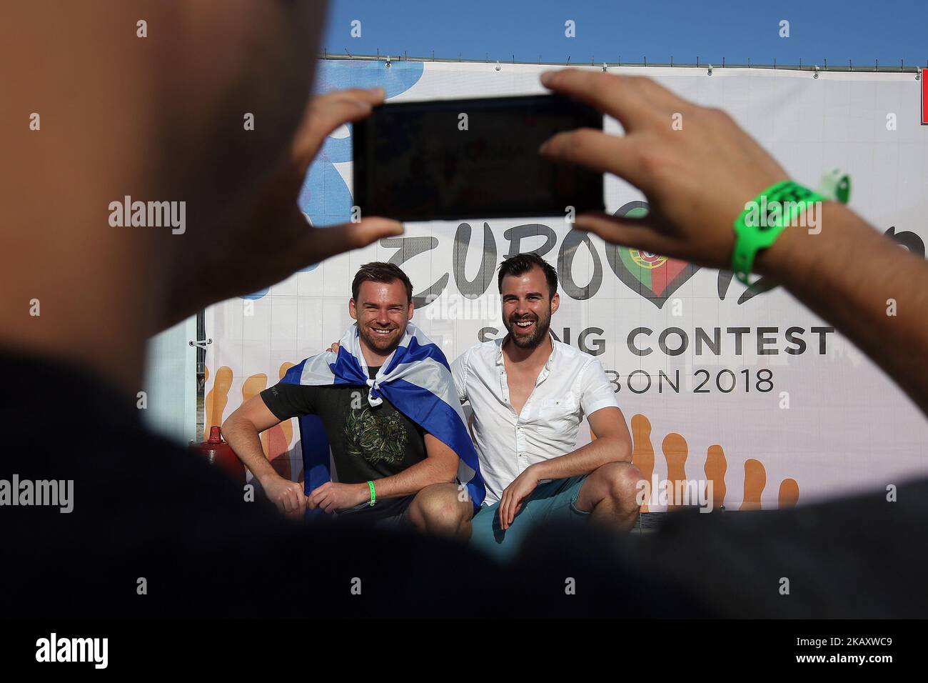 Fans take pictures in front of the Eurovion logo before the first semi ...