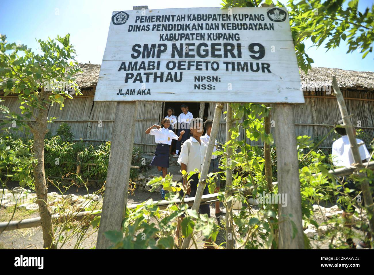 Junior High school students study in makeshift school buildings with ...