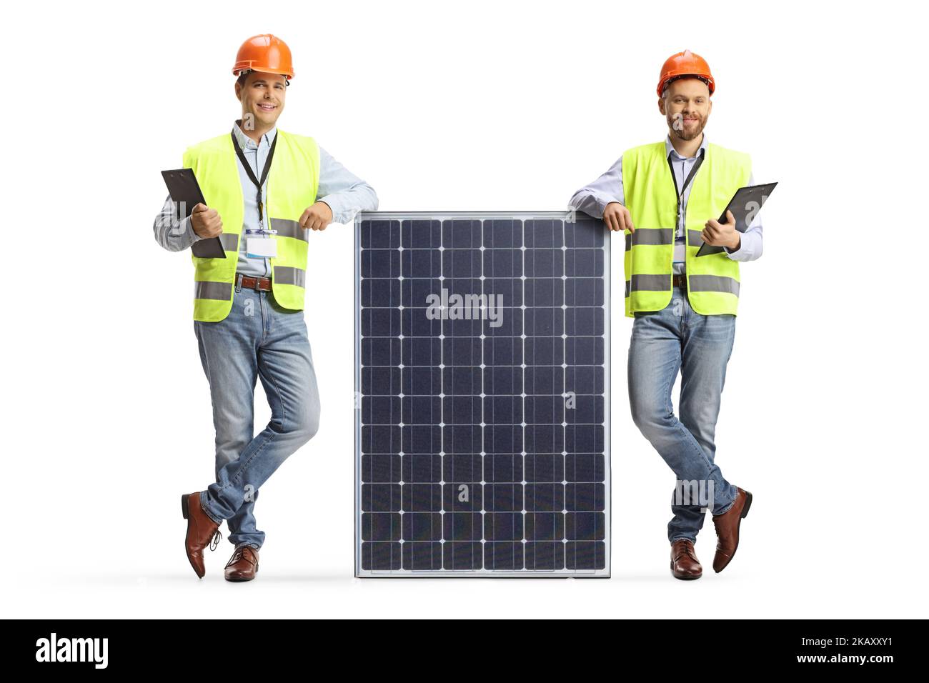 Full length portrait of engineers posing with a solar panel isolated on ...