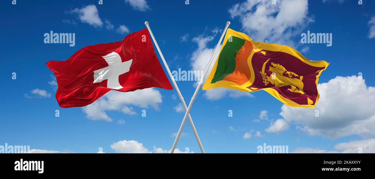 two crossed flags Sri Lanka and Switzerland waving in wind at cloudy ...