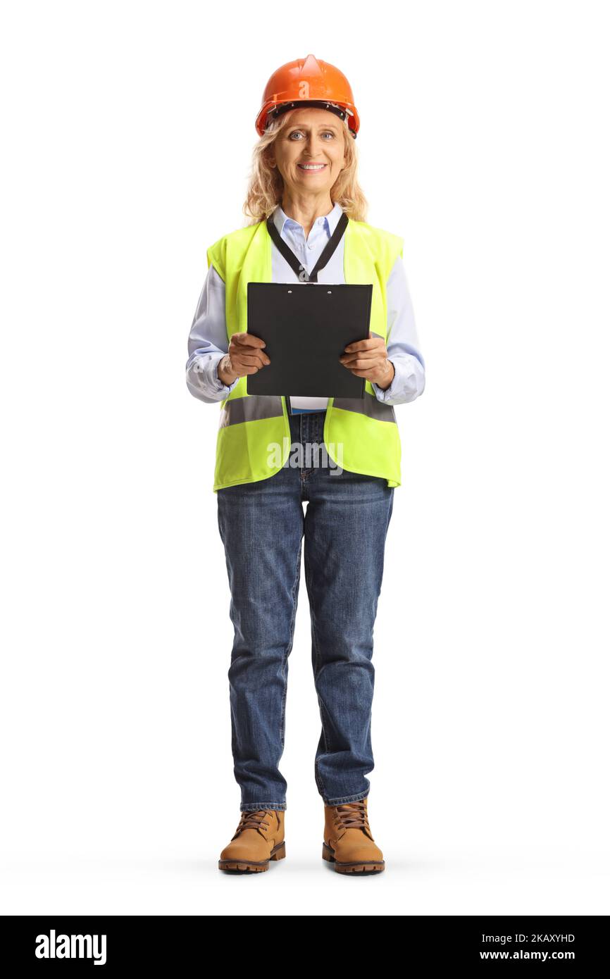 Full length portrait of a female site engineer with a safety vest and ...