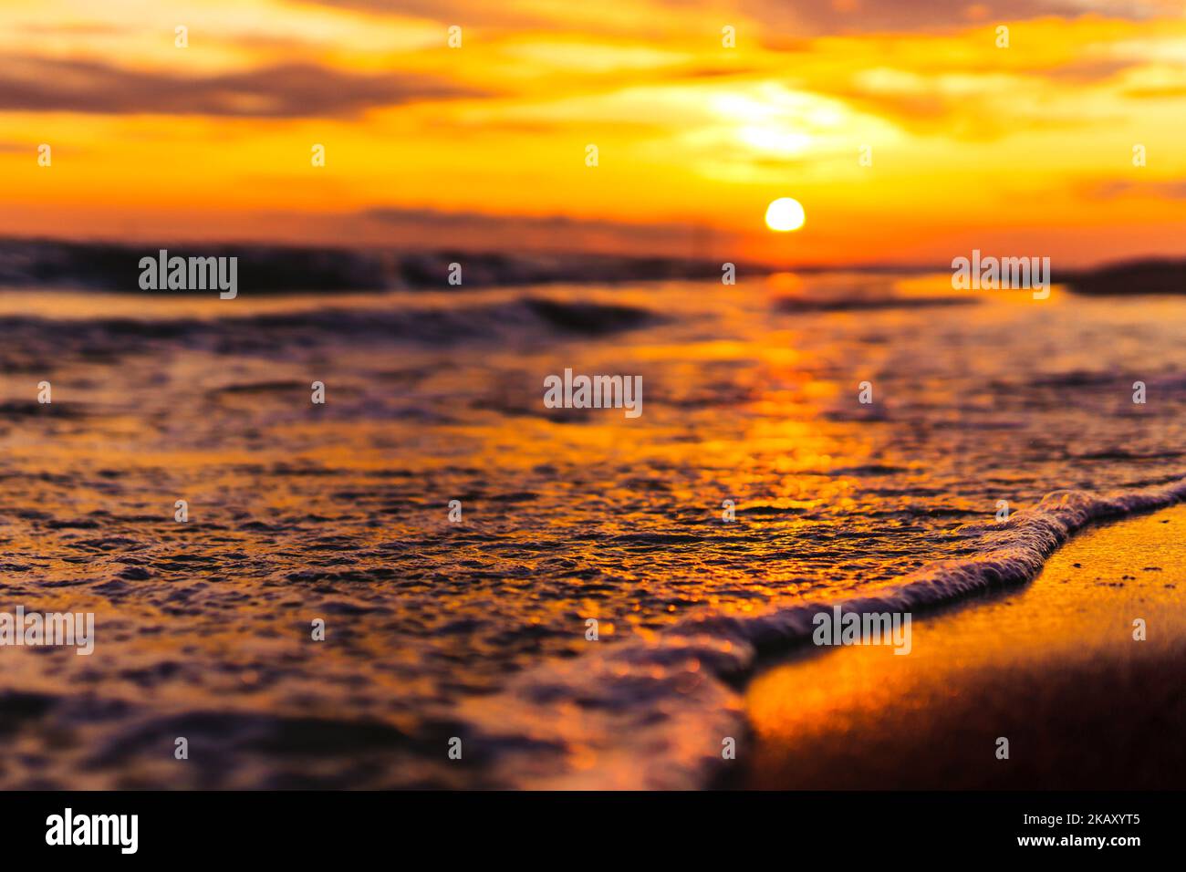 Beautiful sunset on the beach in Montenegro in summer. Natural, warm ...