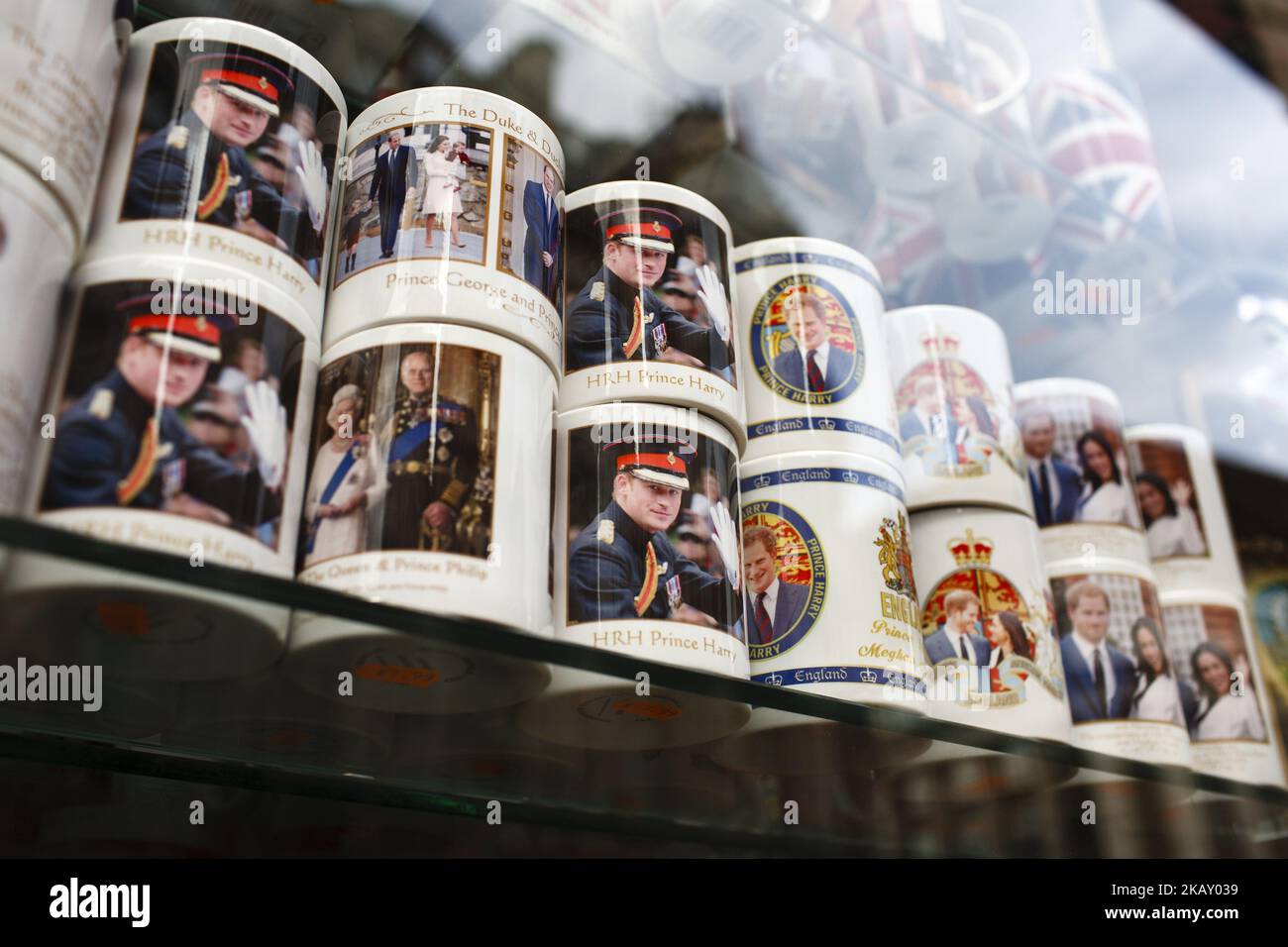 Souvenir mugs of Britain's Prince Harry stand on display in a shop ...