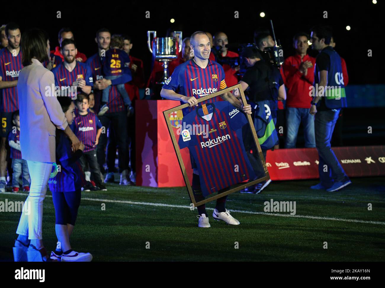 Andres Iniesta with his wife and his daughter at the end of the match ...