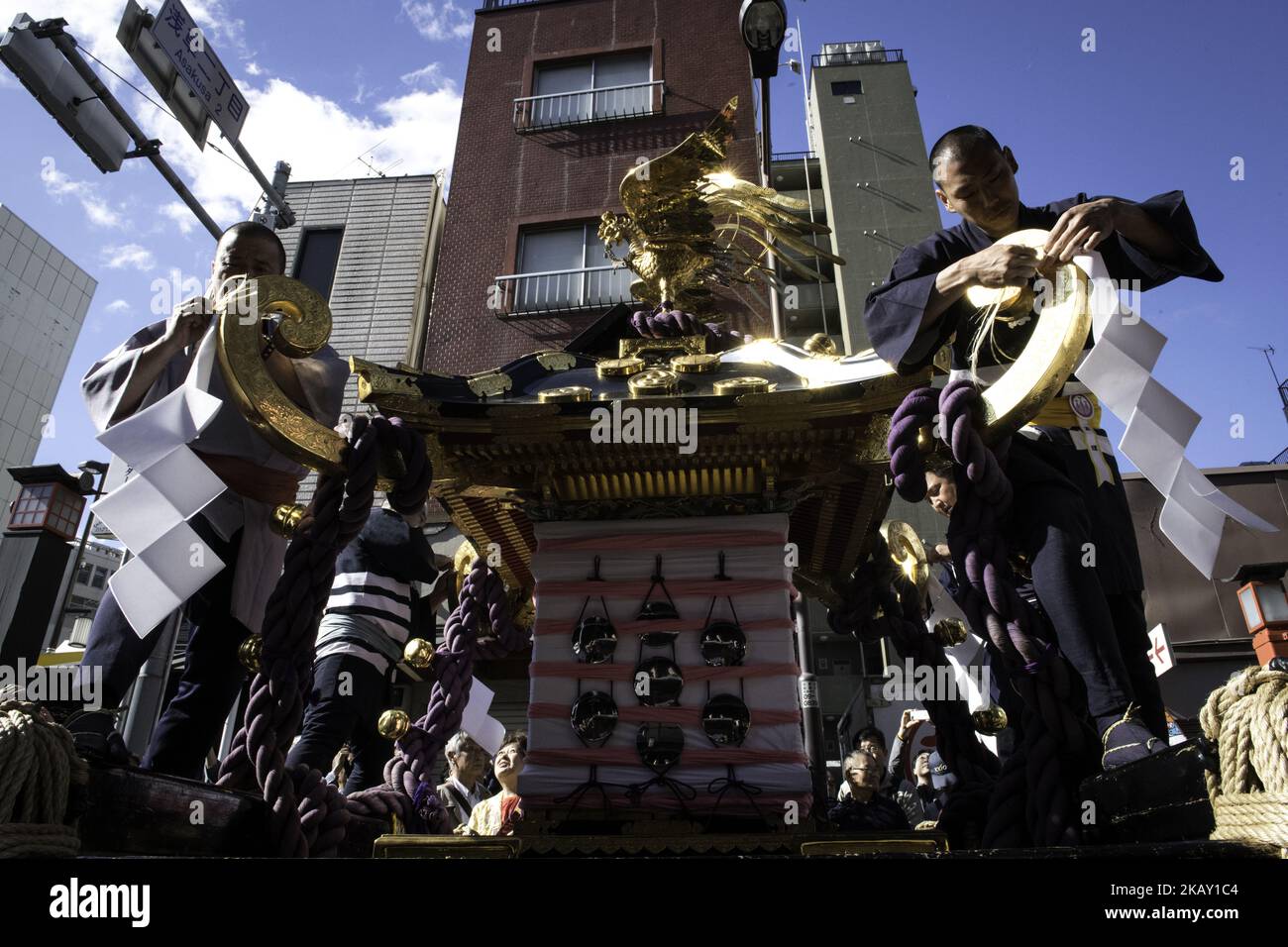 Participants prepares the mikoshi during Tokyo's one of the largest ...