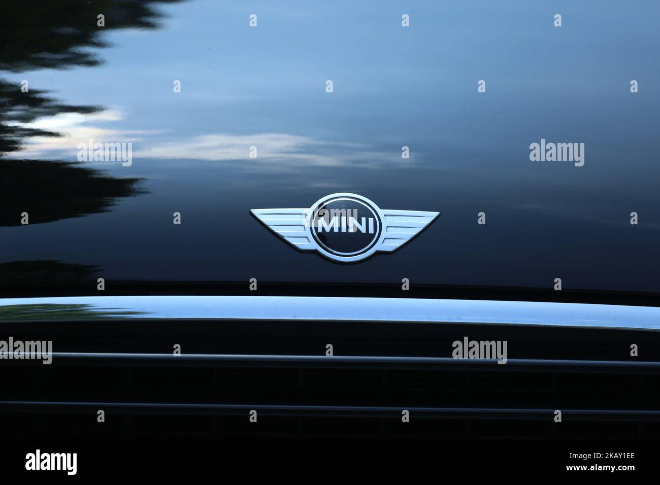 The logo of British automotive marque MINI, owned by BMW since 2000 is ...