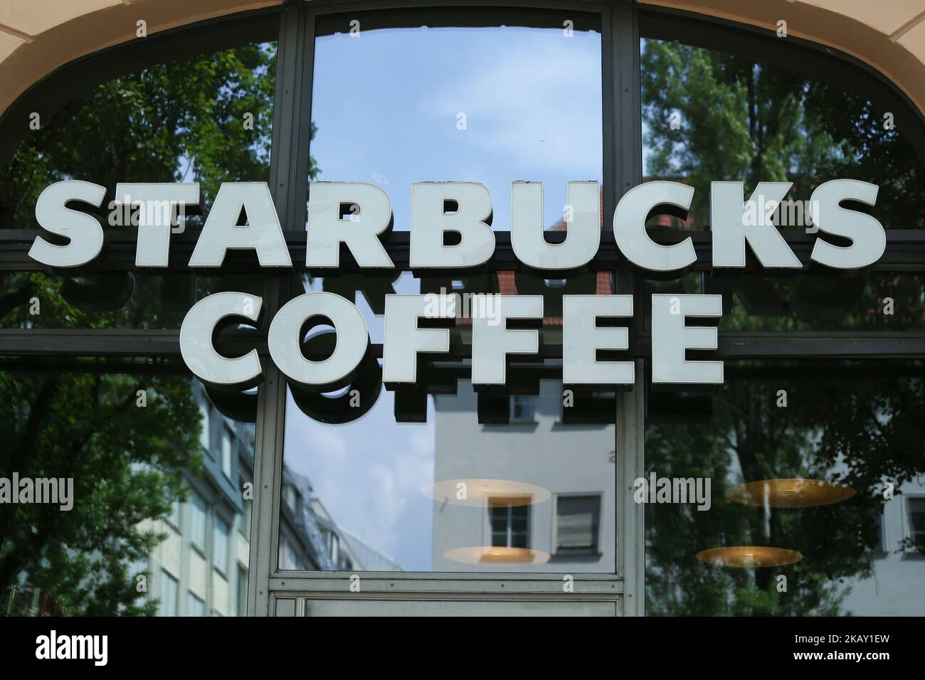 The logo of American coffee company and coffeehouse chain Starbucks is ...