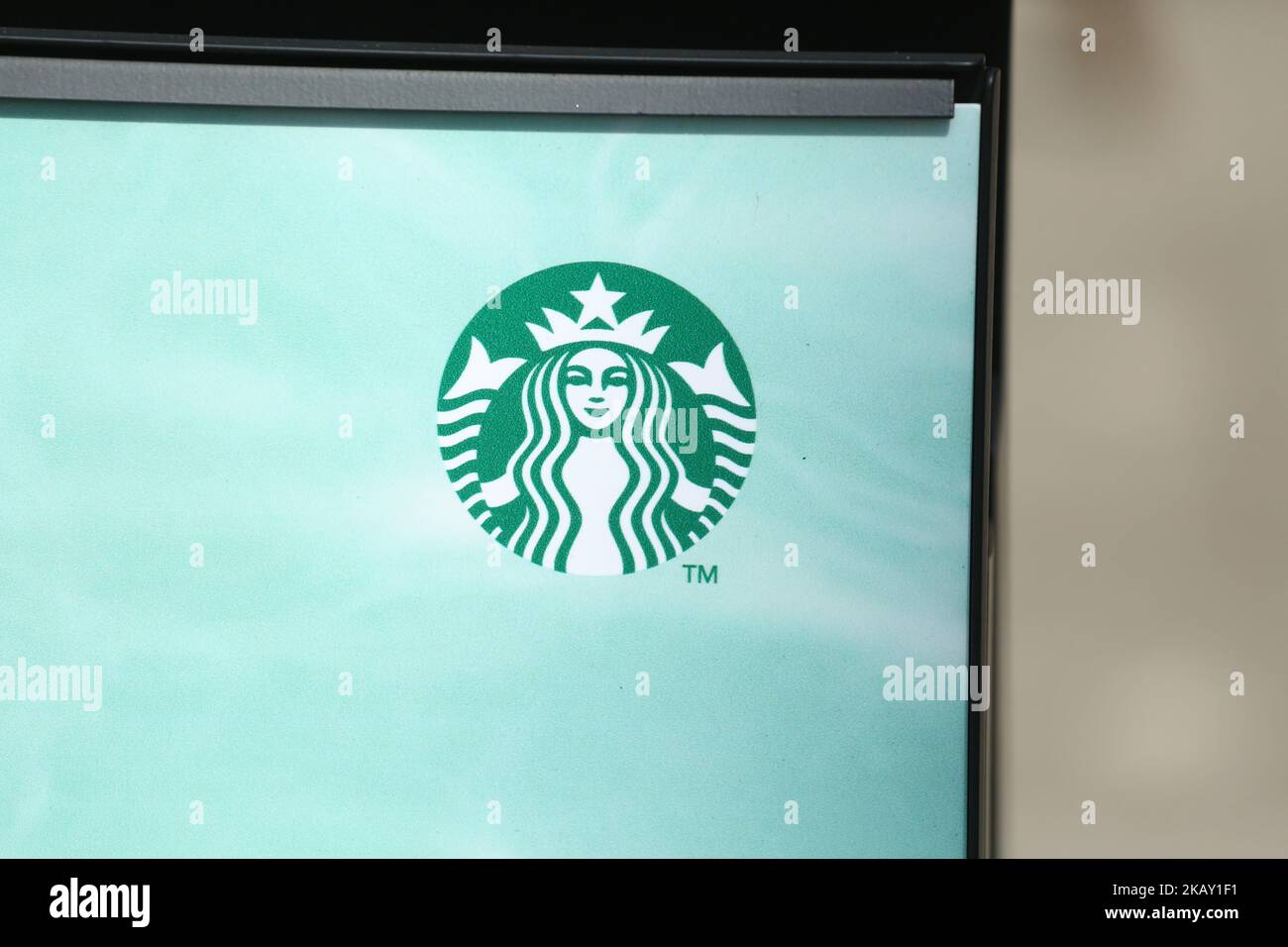 The logo of American coffee company and coffeehouse chain Starbucks is ...