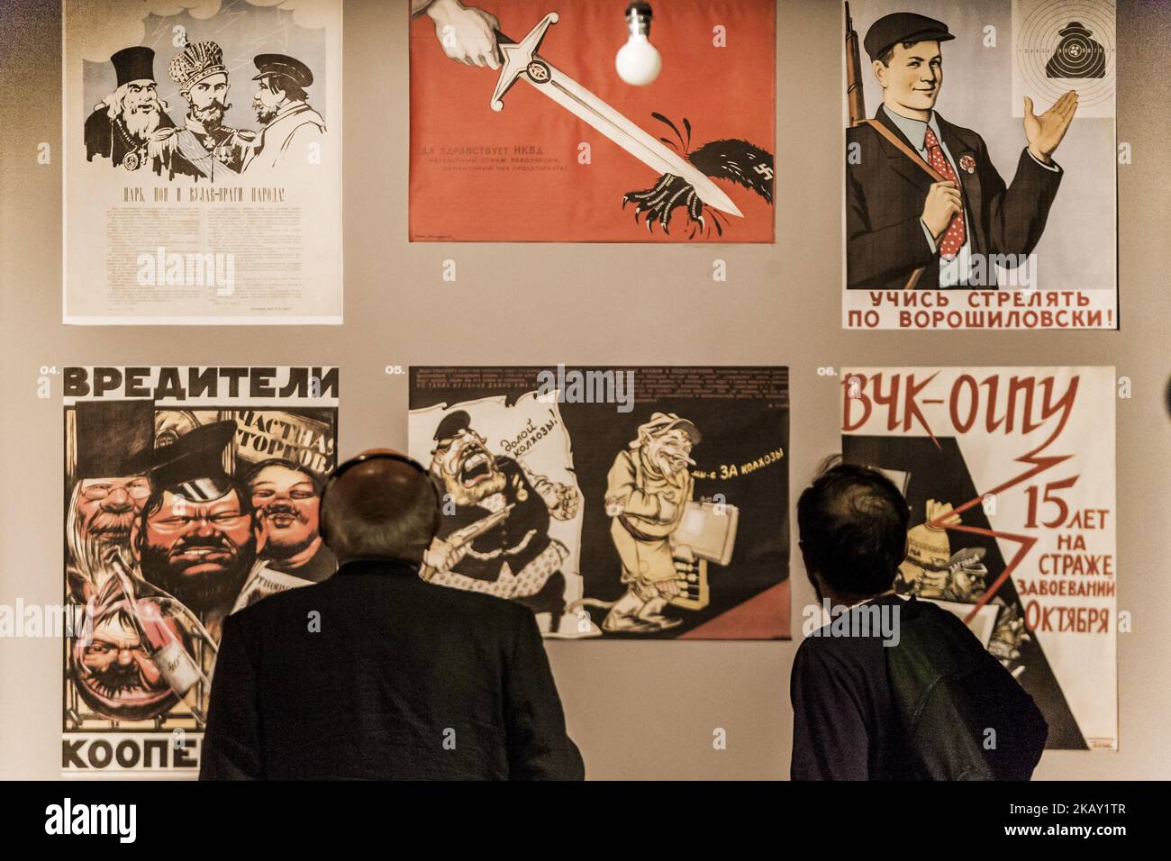 Visitors look soviet propaganda banners of 30´s in a exhibition of the ...