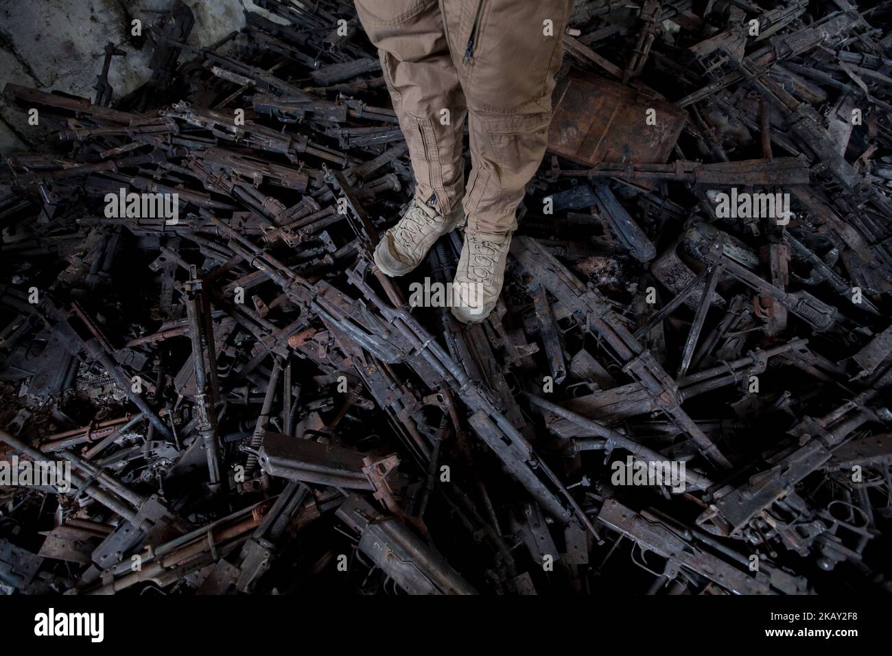 (7/7/2017) An armory in the cellar of a burned house near the front ...