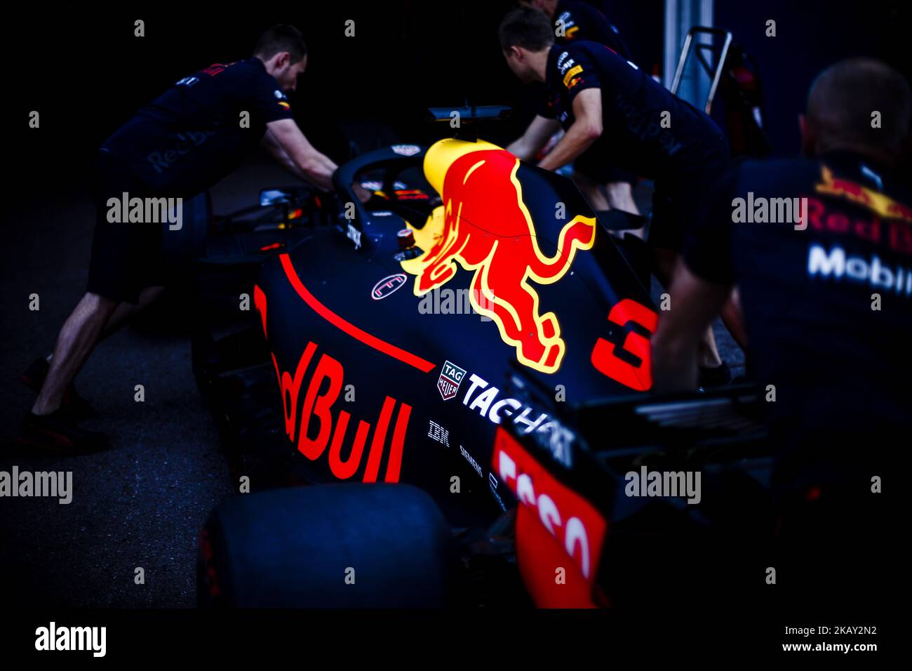 Mechanics working on the 03 Daniel Ricciardo from Australia with Aston ...