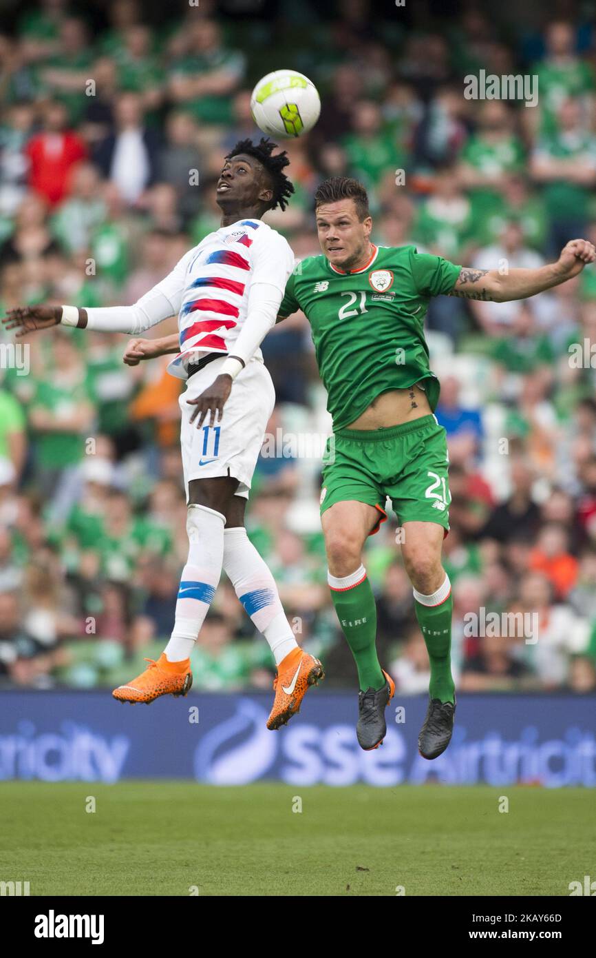 Kevin Long of Ireland jumps with Tim Weah of USA during the ...