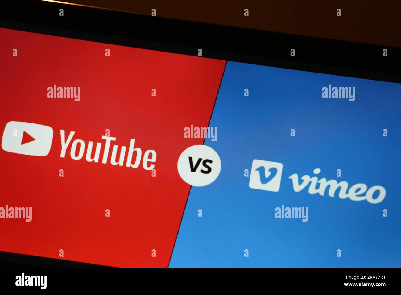 The logos of Youtube and the logo of Vimeo are seen on a screen. (Photo ...