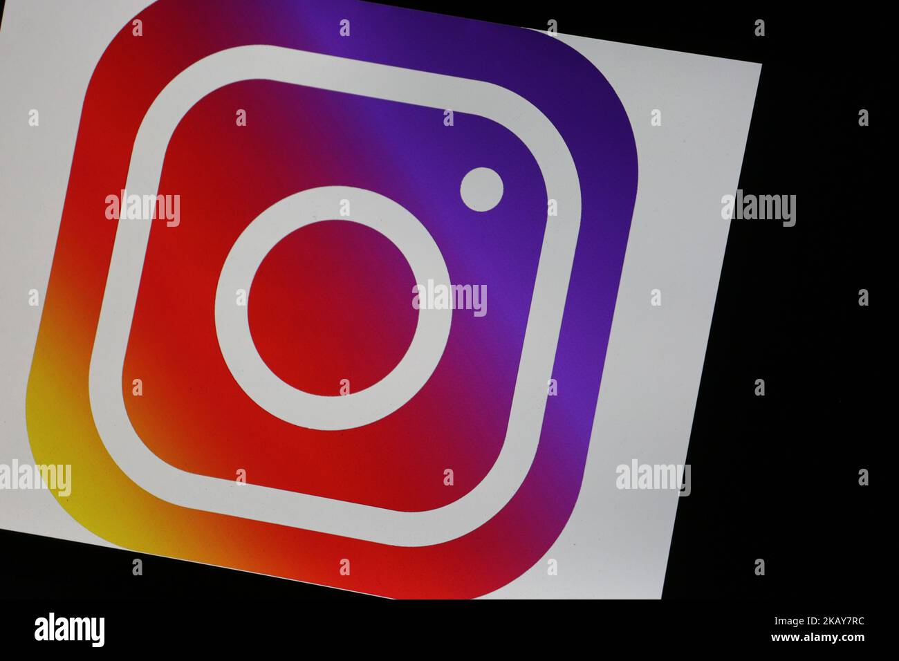 The logo of Instagram is seen on a screen. (Photo by Alexander Pohl ...