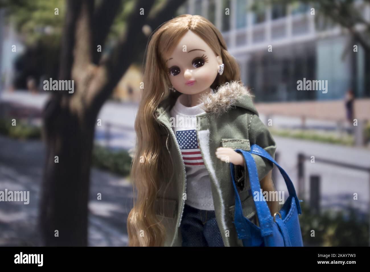 Visitors look at various plastic models Robot on display at the Bandai ...