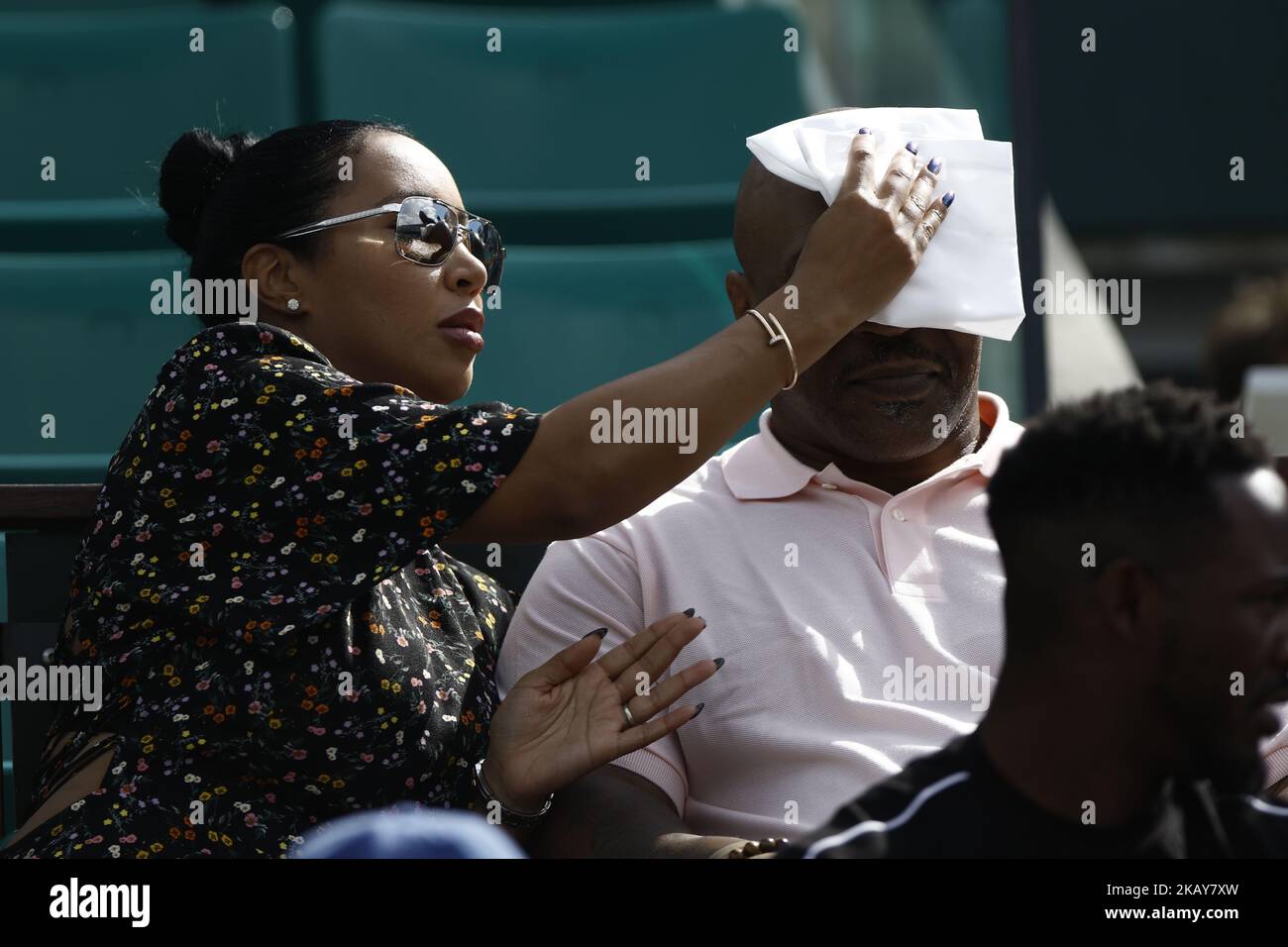 Mike Tyson and Lakiha Spicer attend the tennis match game during the ...