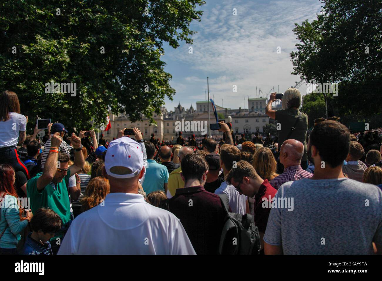 Crowds gathered to watch the Yearly Trooping the Colour held by Queen ...