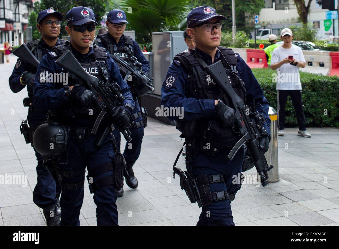 Riot Police outside the St. Regis Singapore hotel in Singapore on June ...