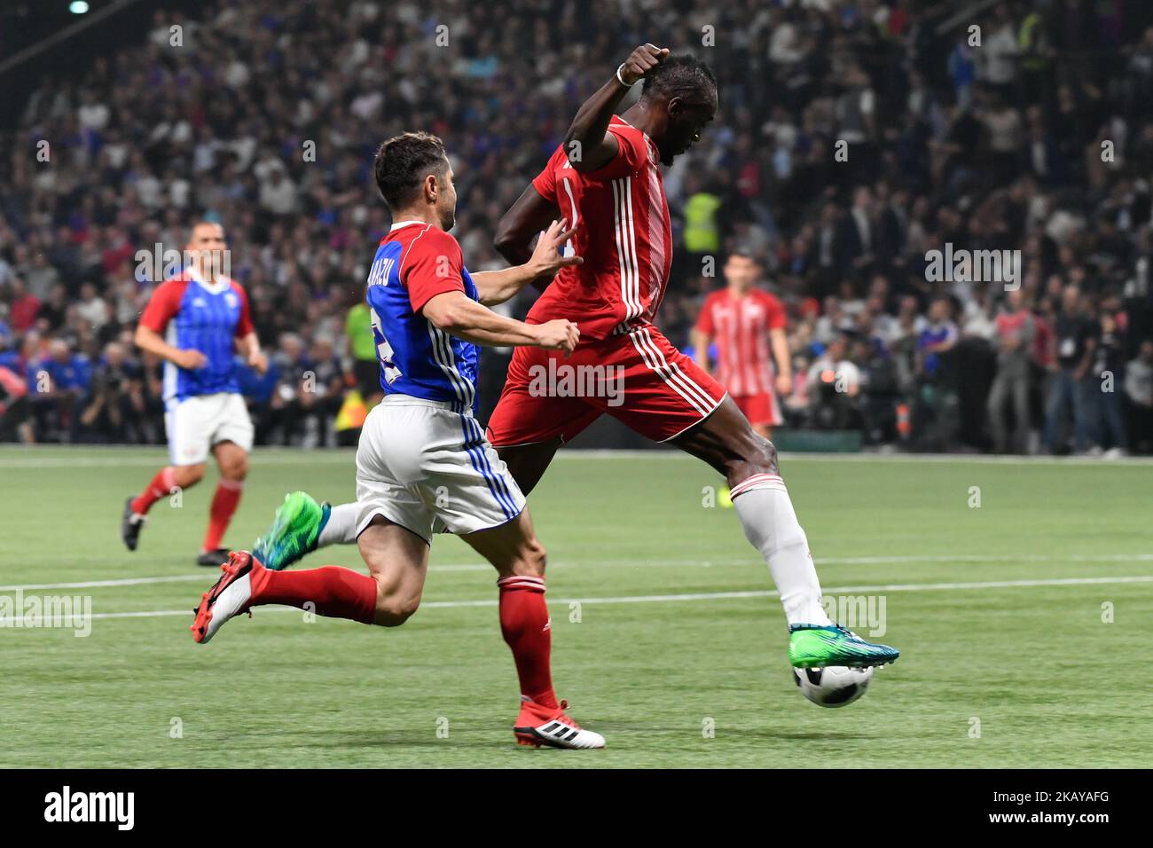Fifa 98's Usain Bolt reatcs during an exhibition football match between ...